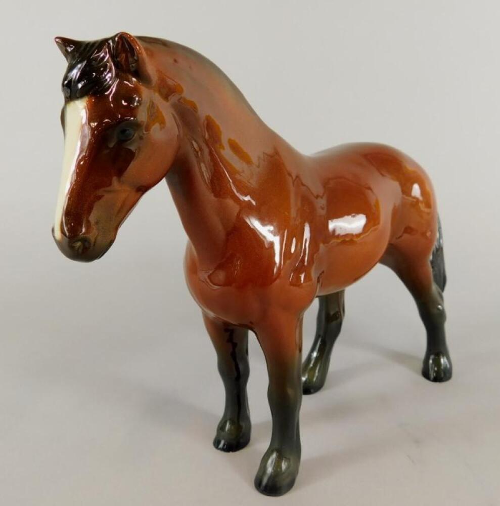 A Goebel ceramic model of a brown horse