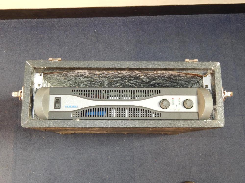 A QSC audio 1600 watt PLX 1602 twin channel power amplifier