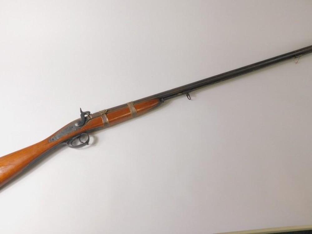 A muzzle loading double barrel shotgun