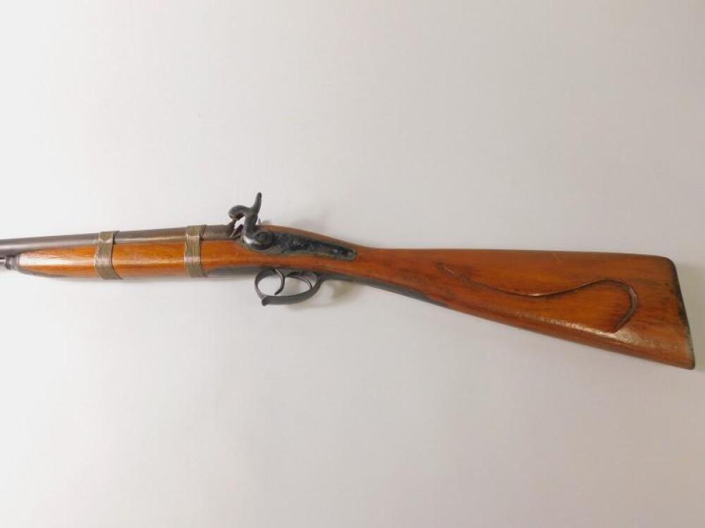 A muzzle loading double barrel shotgun