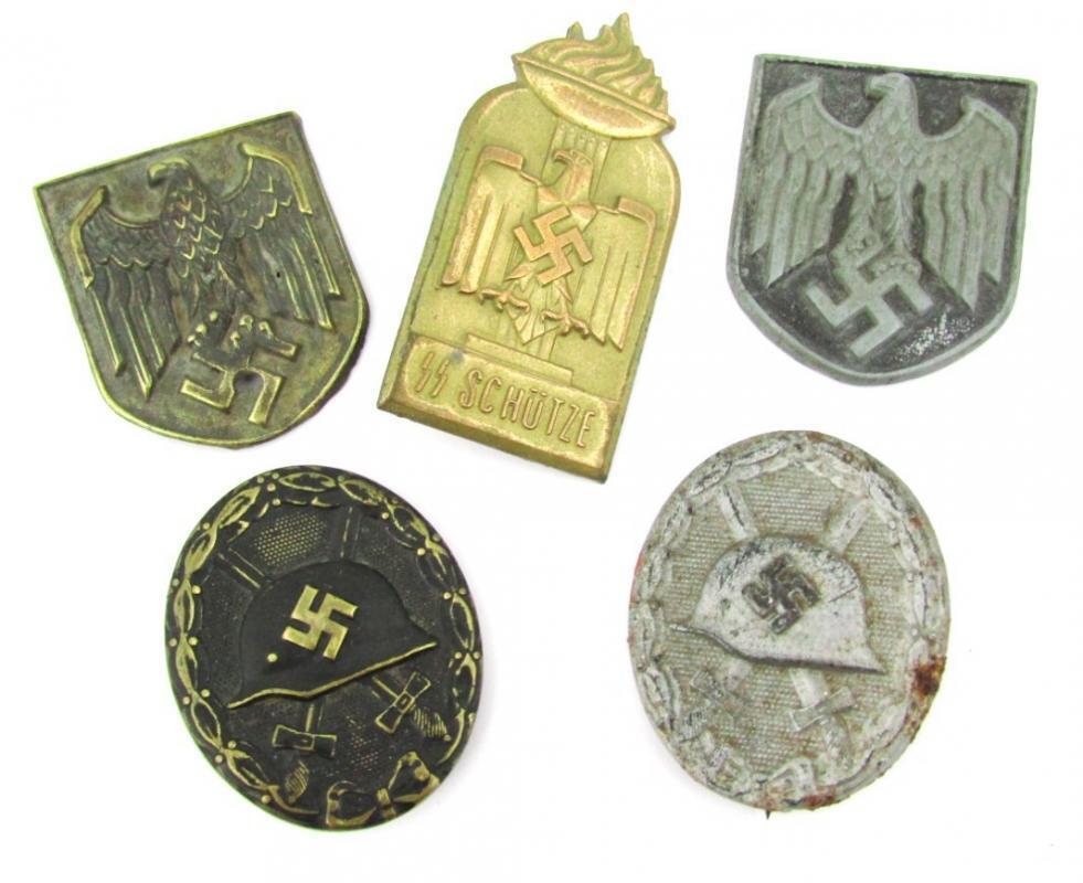 Various Nazi and German cap badges