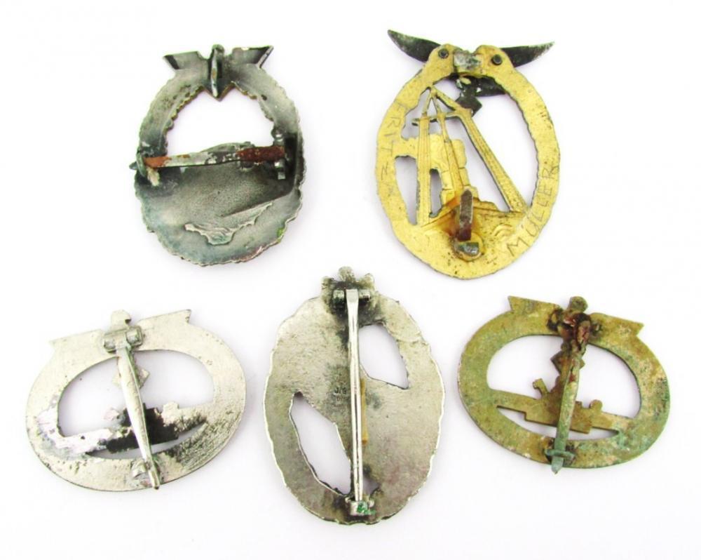 Various Nazi and German cap badges