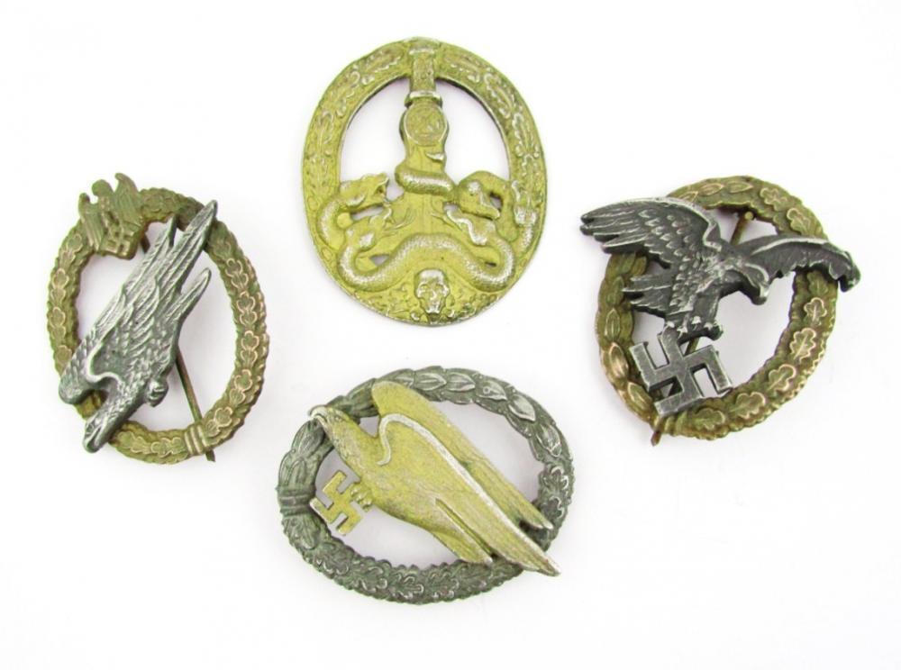 Various Nazi and German cap badges