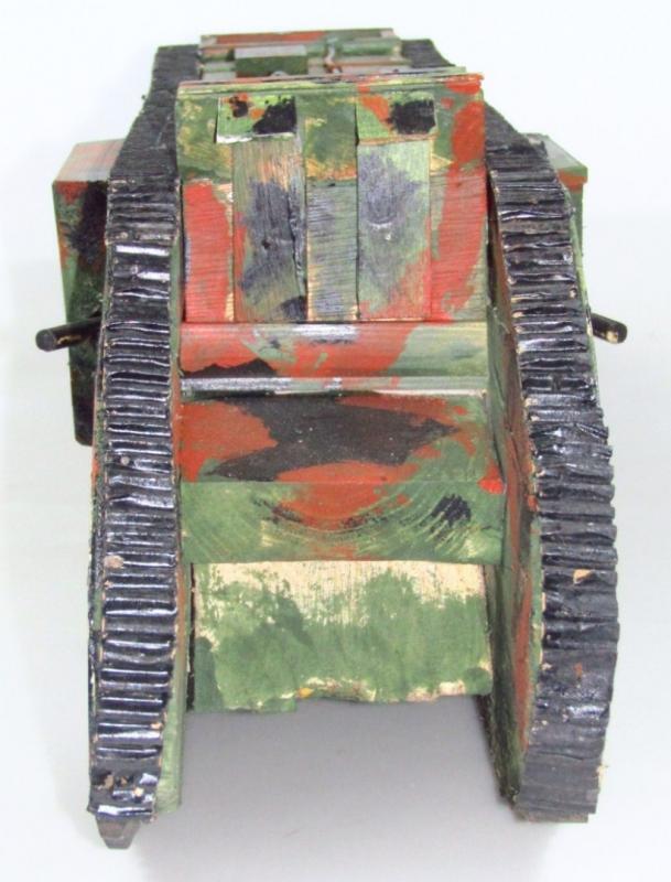 A modern scratch built wooden model of a WWI tank