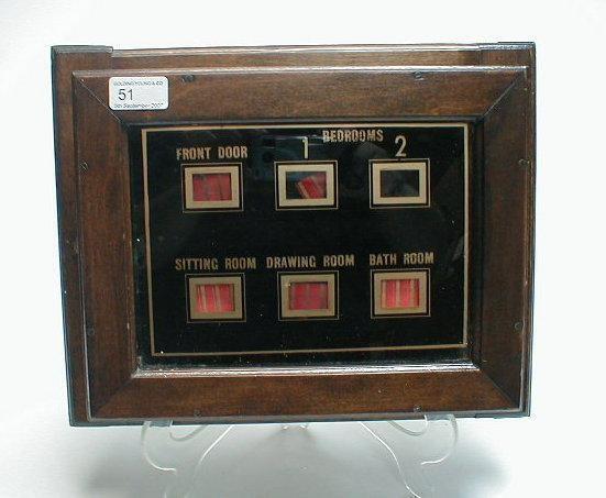 An early 20thC stained beech bell board