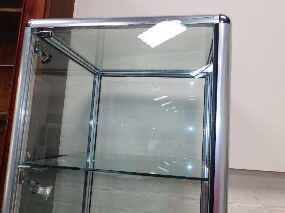 A modern metal framed display cabinet