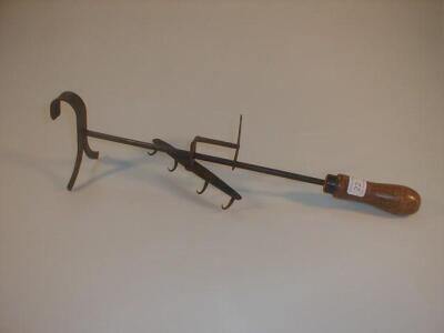 A rare 18thC wrought iron lark spit with four hooks and turned oak handle
