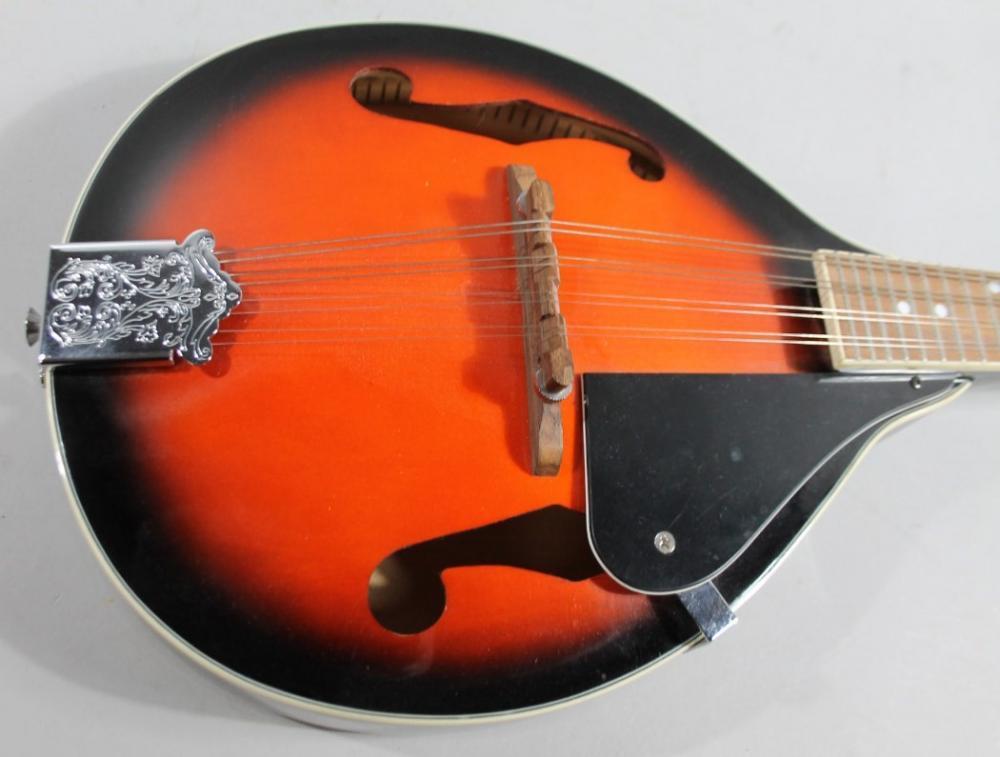 A modern eight string Stagg mandolin model M20 1006/25