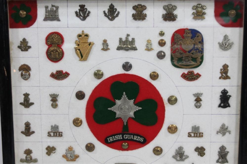 Various army and war related Irish cap badges