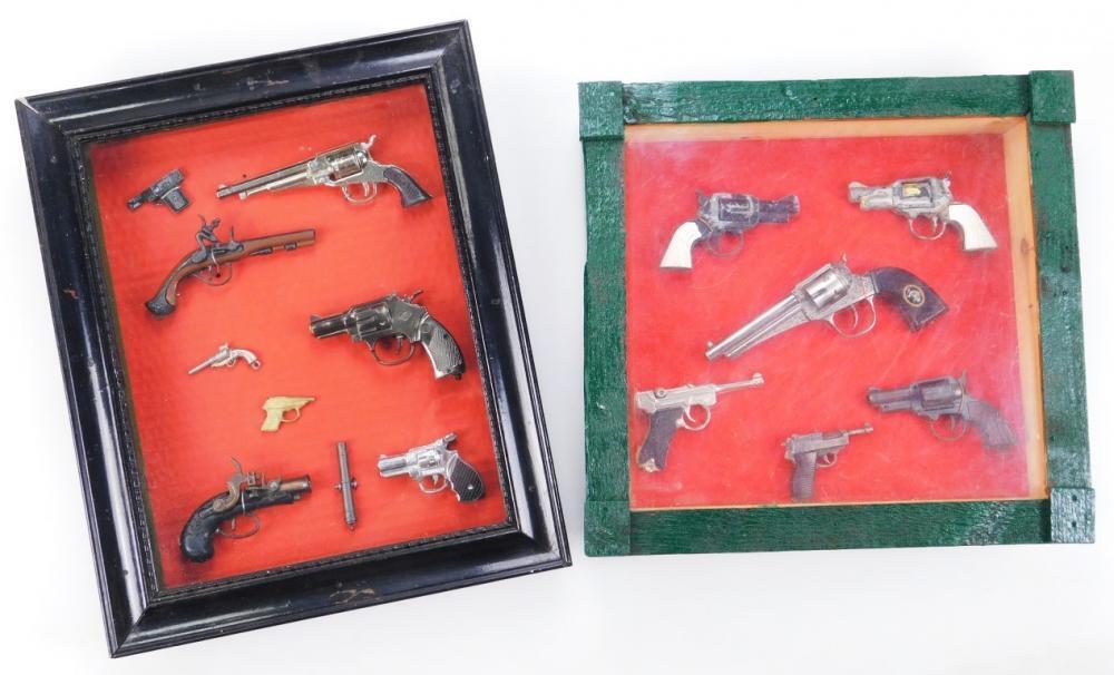A cased set of miniature replica pistols
