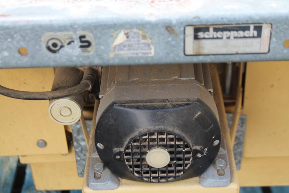A Scheppach metal work bench with circular saw.