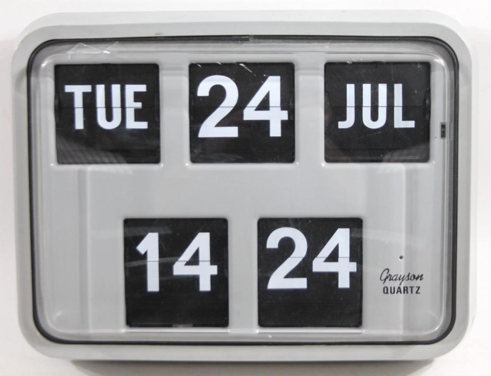 A 1980's retro electric Grayson quartz wall clock