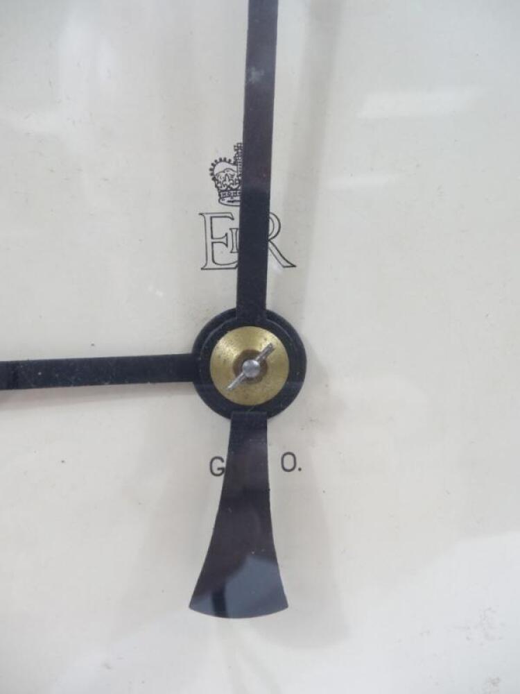 A GPO late 20thC mahogany octagonal cased double sided wall clock