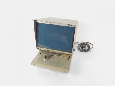 A Bell & Howell SRII microfiche reader.