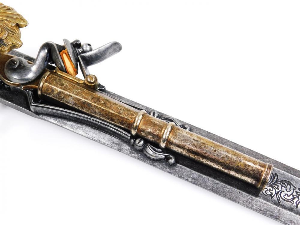 A reproduction flintlock pistol knife gun
