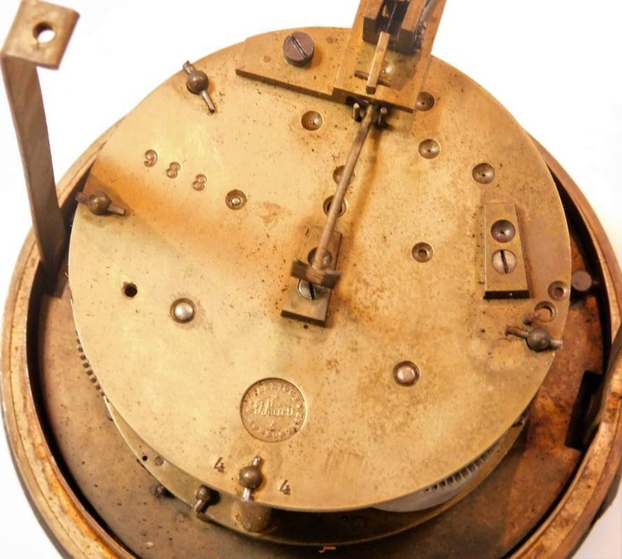 Two brass 8-day clock movements, one with 11cm Dia. Arabic dial and ...