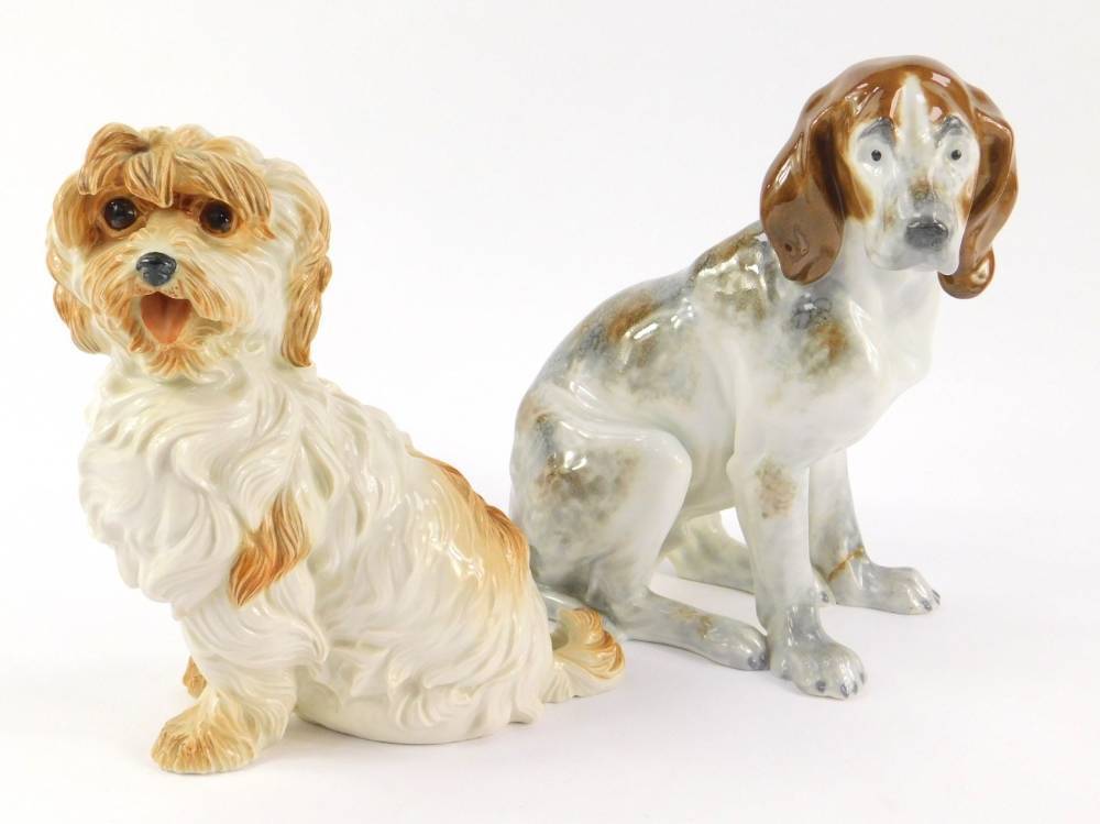 A Karl Ens Volkstedt porcelain figure modelled as a seated pointer dog ...