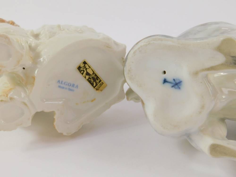 A Karl Ens Volkstedt porcelain figure modelled as a seated pointer dog ...