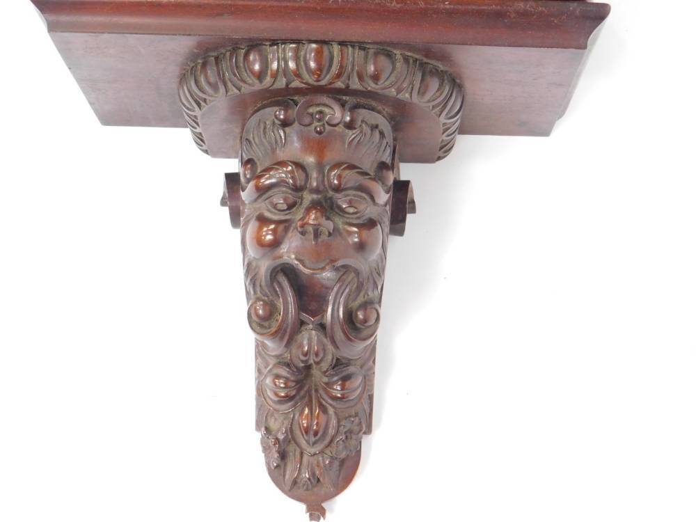 A Victorian mahogany balloon bracket clock, the circular dial bearing ...