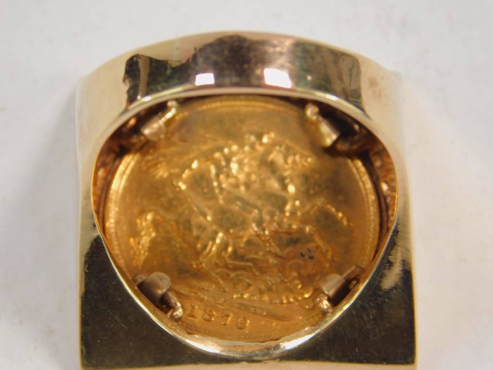 A Queen Victoria gold young head sovereign 1879, in a 9ct gold square ...