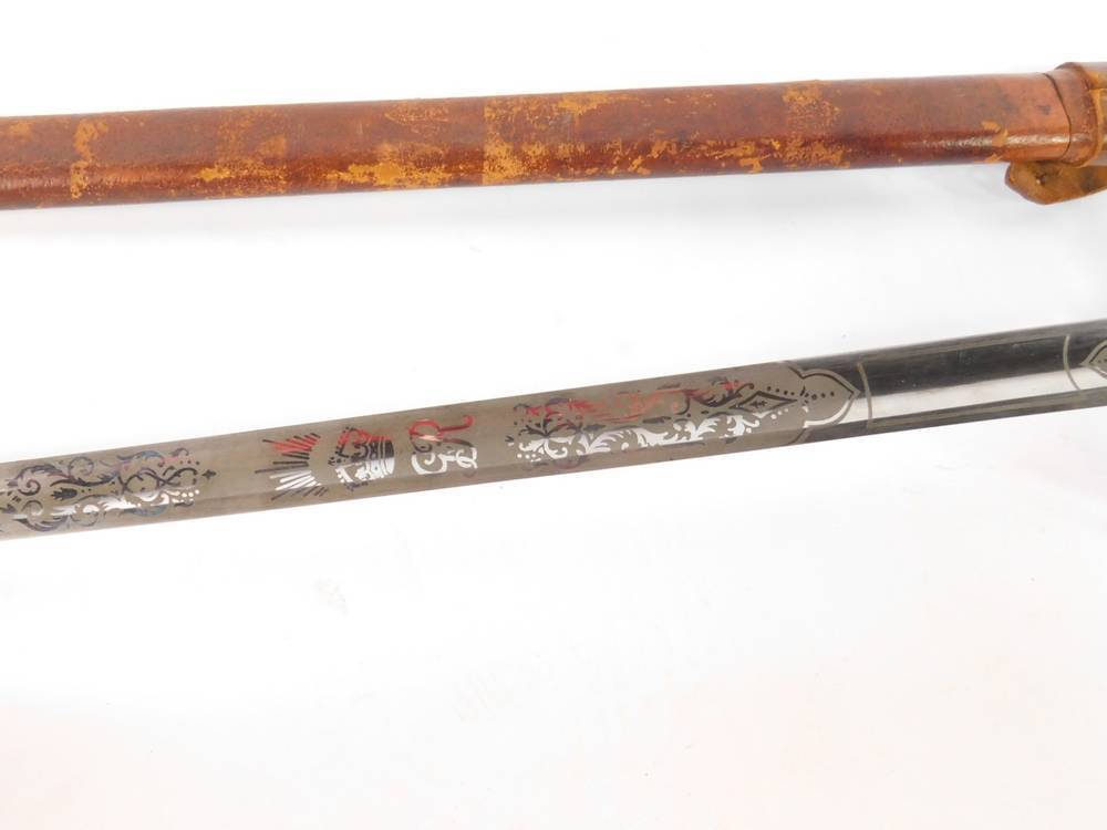 A George V infantry sword, with a brass hilt and wire bound shagreen ...