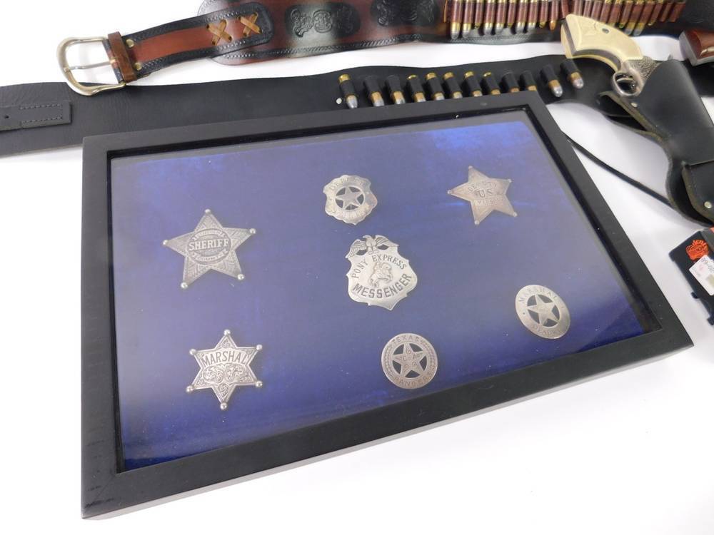 A replica Colt Pistol, with holster, belt and ammunition, further Colt ...