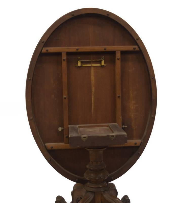 A Victorian walnut loo table, with a moulded oval quarter veneered ...