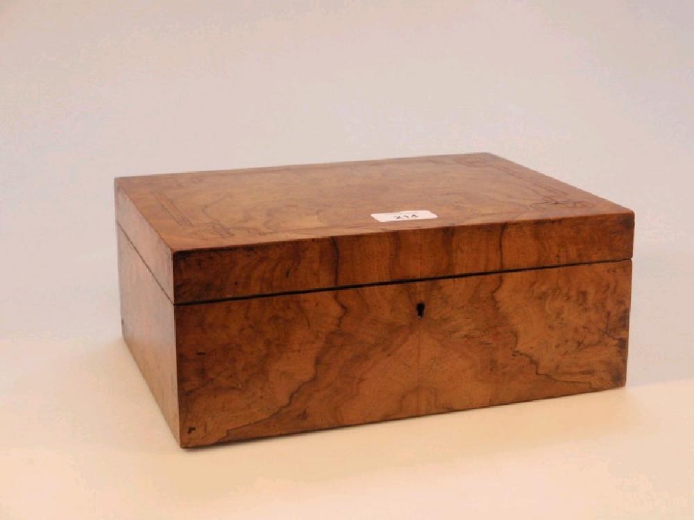A Victorian rectangular figured walnut work box with cross banded inlay