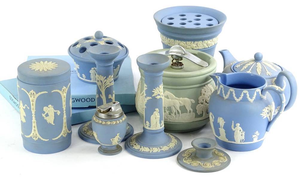 A collection of Wedgwood Jasperware, mainly blue but also a green ...