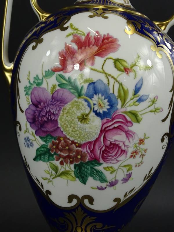 A Spode two handled porcelain vase, decorated with flowers, made to ...