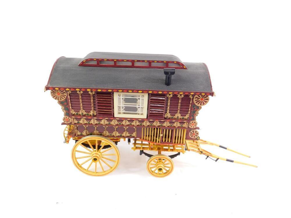 A wooden scratch built model of a gypsy caravan, with a fitted interior ...