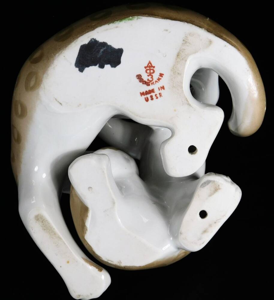 A large Russian porcelain figure group of two leopards fighting ...