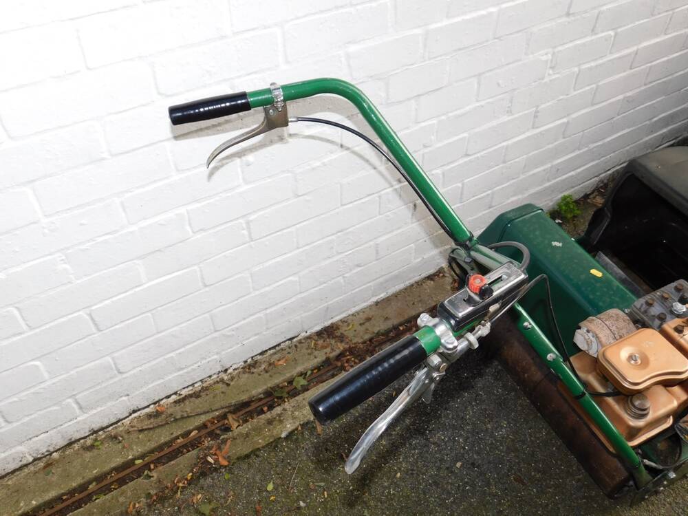 A Webb 21 cylinder motor mower, with a Briggs & Stratton 3hp motor,.