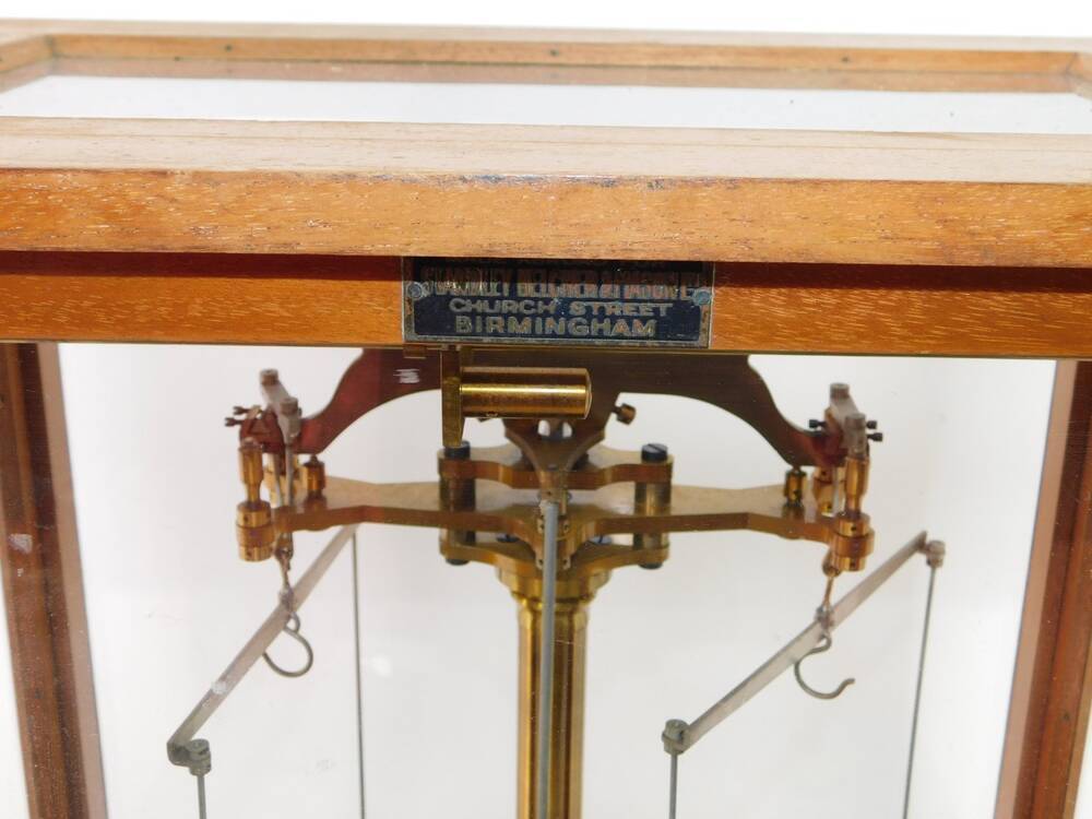 A set of Paul Bunge of Hamburg brass laboratory balance scales, oak ...