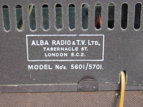 A Vintage Alba radiogram, with speaker front and articulated drawer, on ...