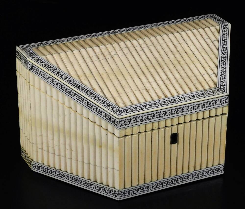 An early 19thC Anglo Indian Vizagapatam type ivory desk tidy, of shaped ...