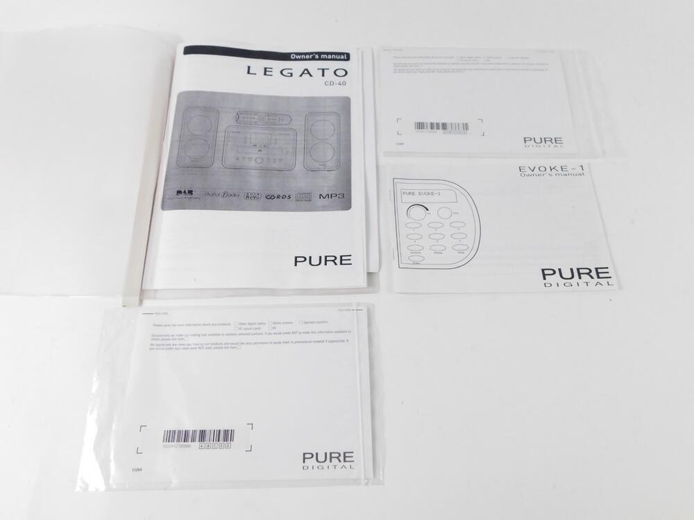 A Pure Evoke -1 Digital Radio, Pure Legato CD player, and a pair of ...