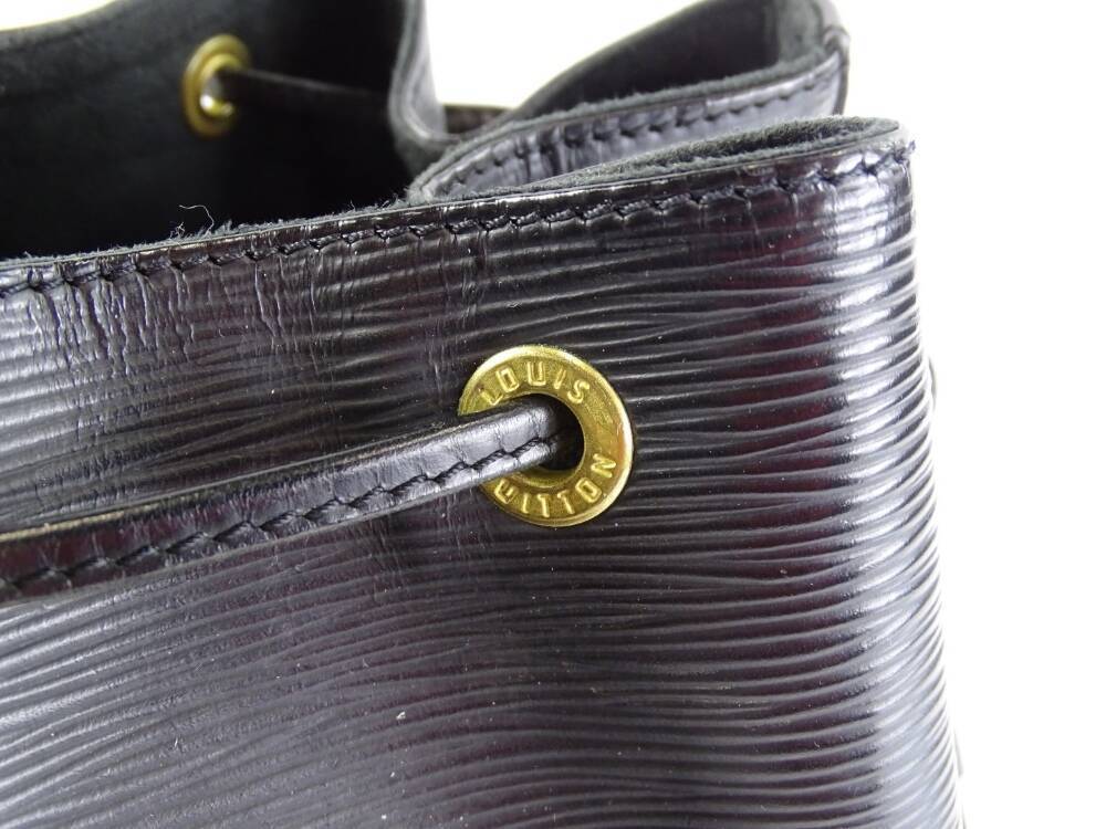 A Louis Vuitton Epi Leather Noe handbag, in black, with brass hardware ...