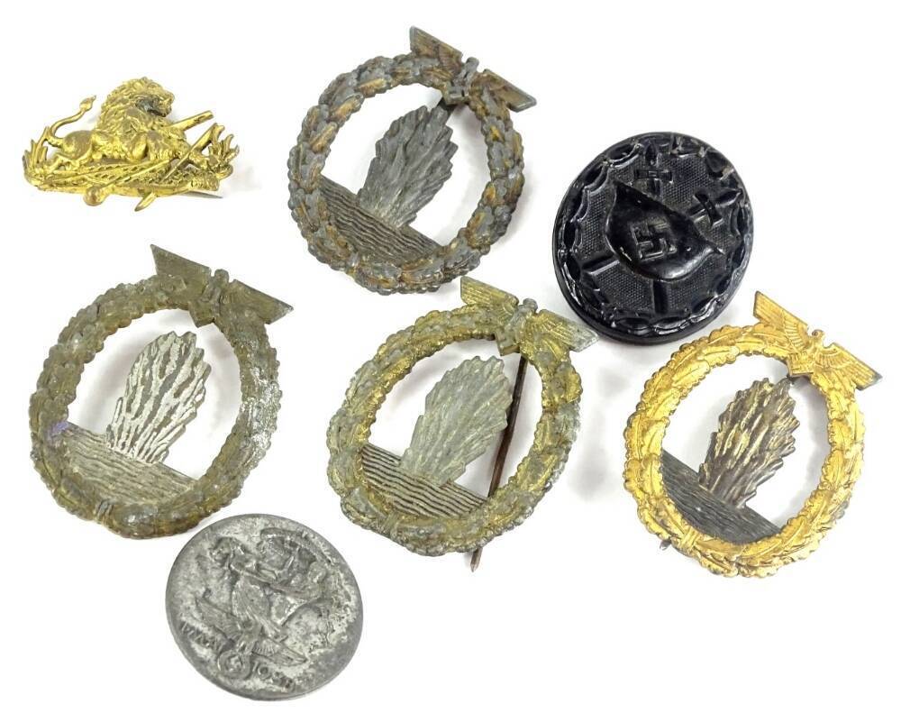 A collection of German Second World War Third Reich badges, to include ...