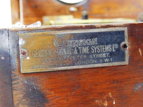 A Gensign mahogany cased pigeon racing timer clock, 32cm high, 35cm wide.