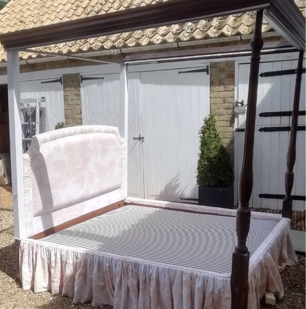A Hepplewhite style mahogany four poster bed, with turned circular ...