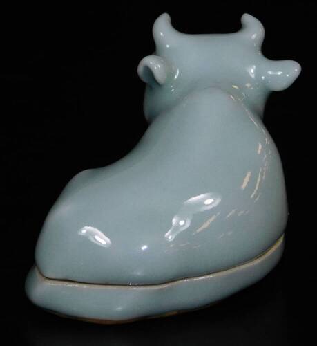 A Japanese celadon circular porcelain kogo (incense box), decorated in ...