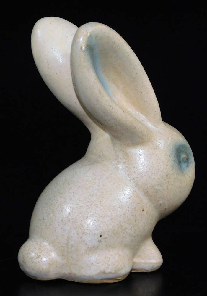 A 20thC Bourne Denby Dorothy Ware rabbit, in speckled cream colour way ...