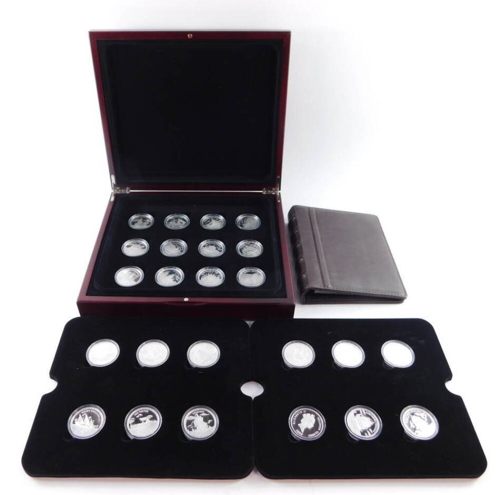 A Royal Mint set of twenty four silver commemorative coins, Legendary ...