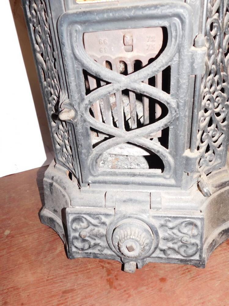 A French late 19thC cast iron and enamel Goudin stove, by Dequenne ...