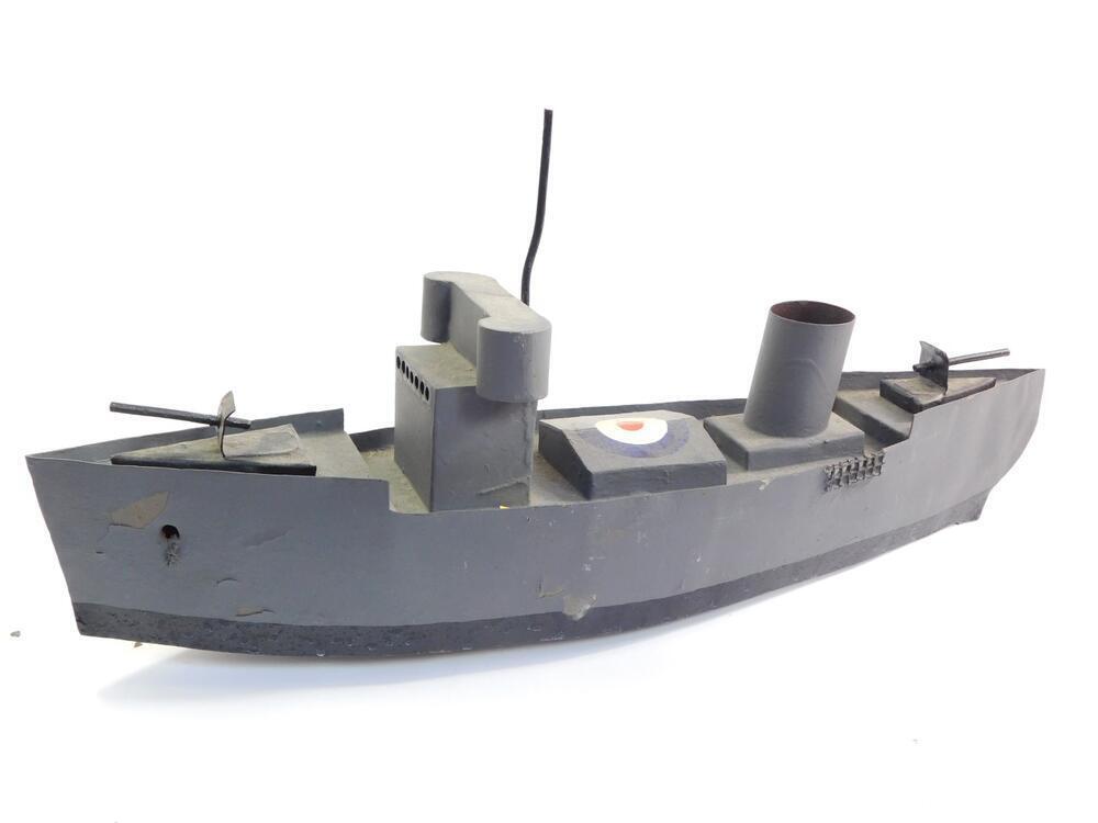 A scale model of a WWII British Naval gun boat, raised on rollers, 59cm ...