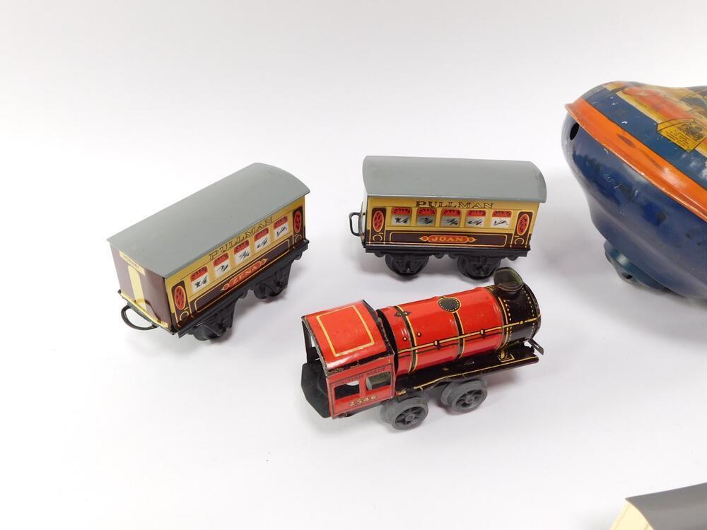 A British tin plate clockwork locomotive, a pair of Hornby O gauge ...