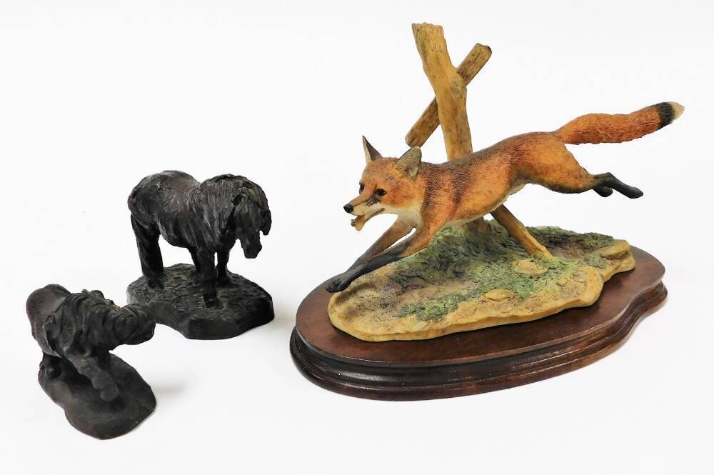 A Border Fine Arts model of a running fox, with wooden detachable ...
