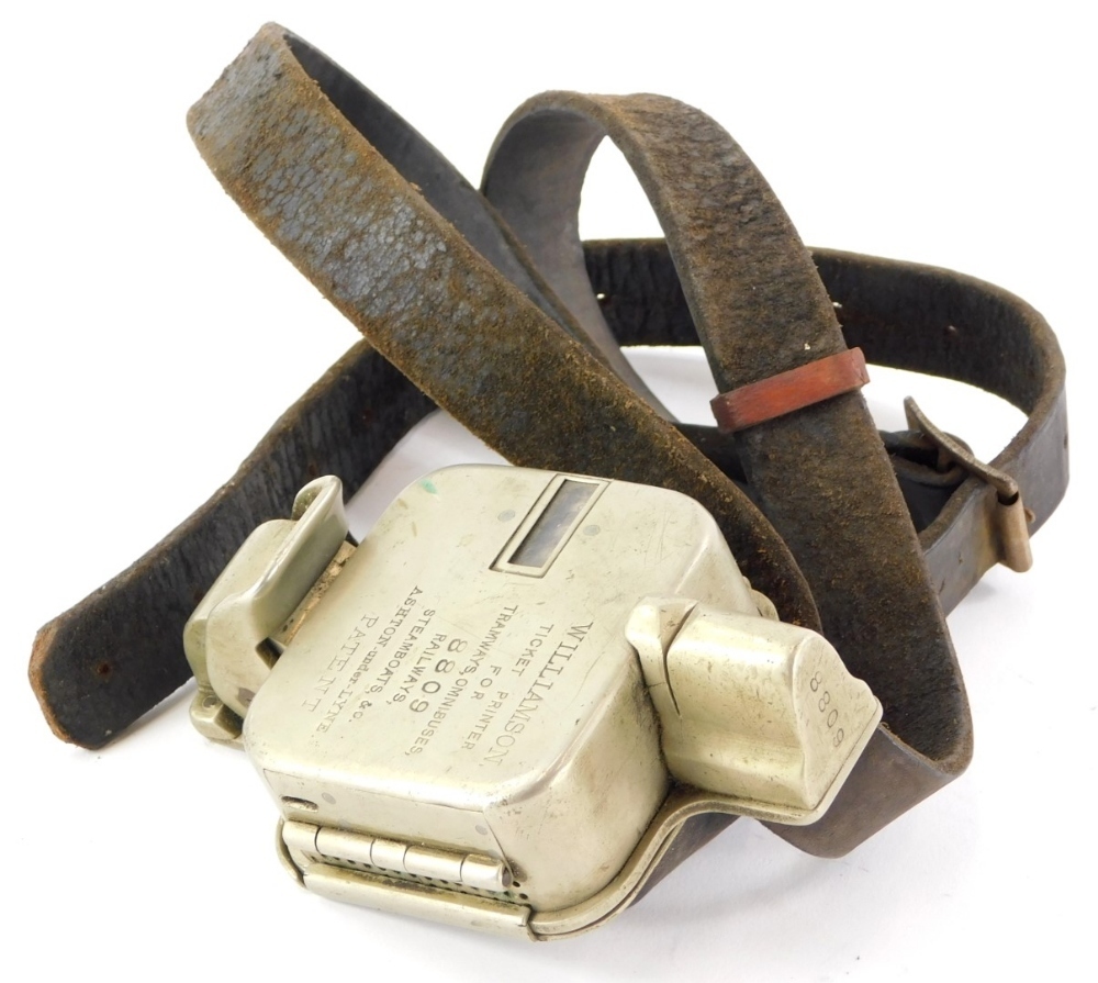 A vintage ticket punching machine, stamped Williamson ticket printer ...
