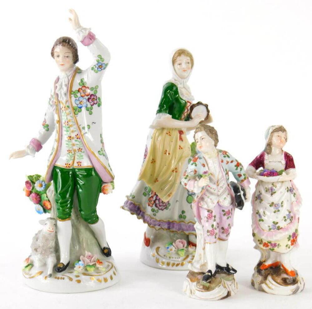 A pair of late Sitzendorf figures of a shepherd and shepherdess, in ...